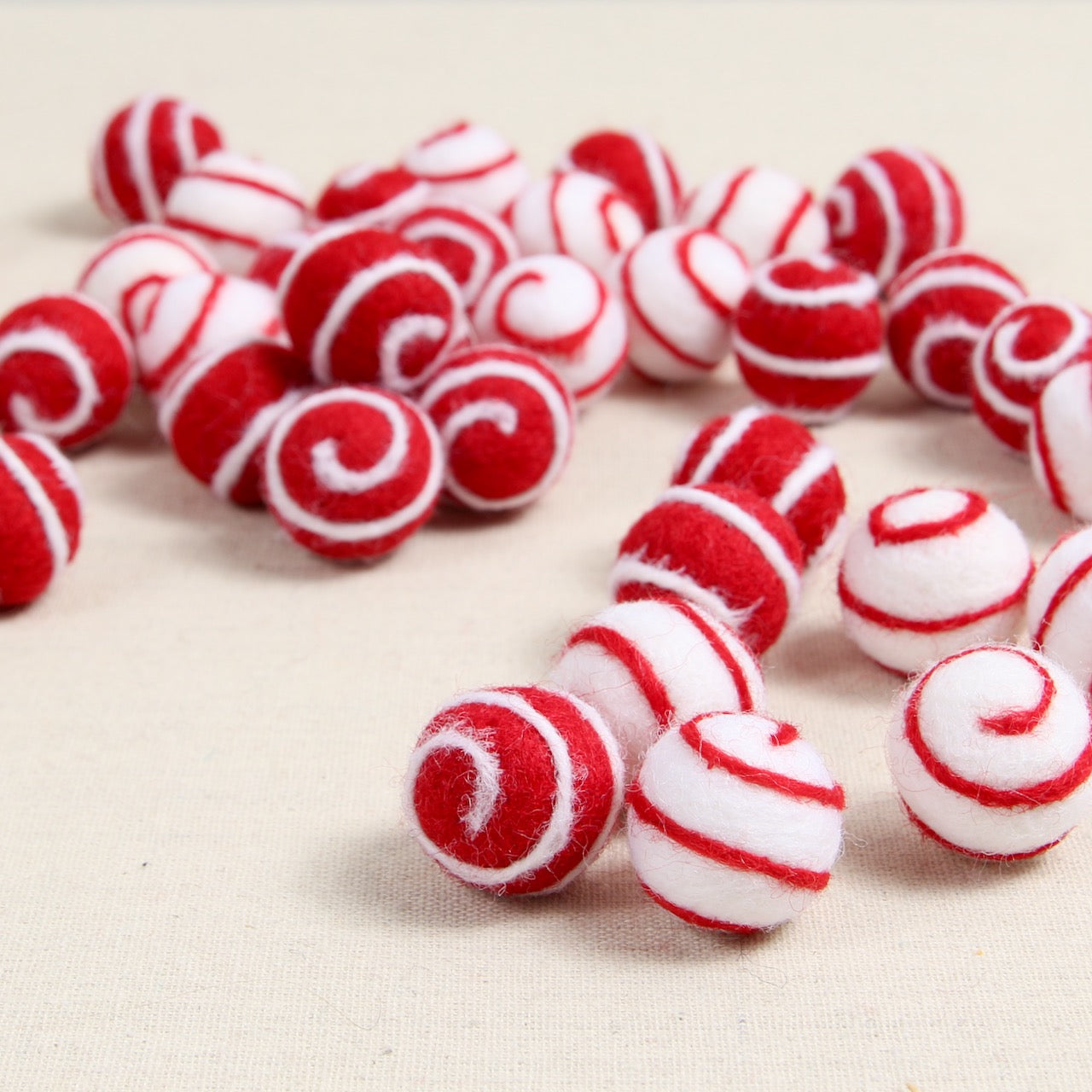 Red with White Swirl, Felted Ball – Benzie Design